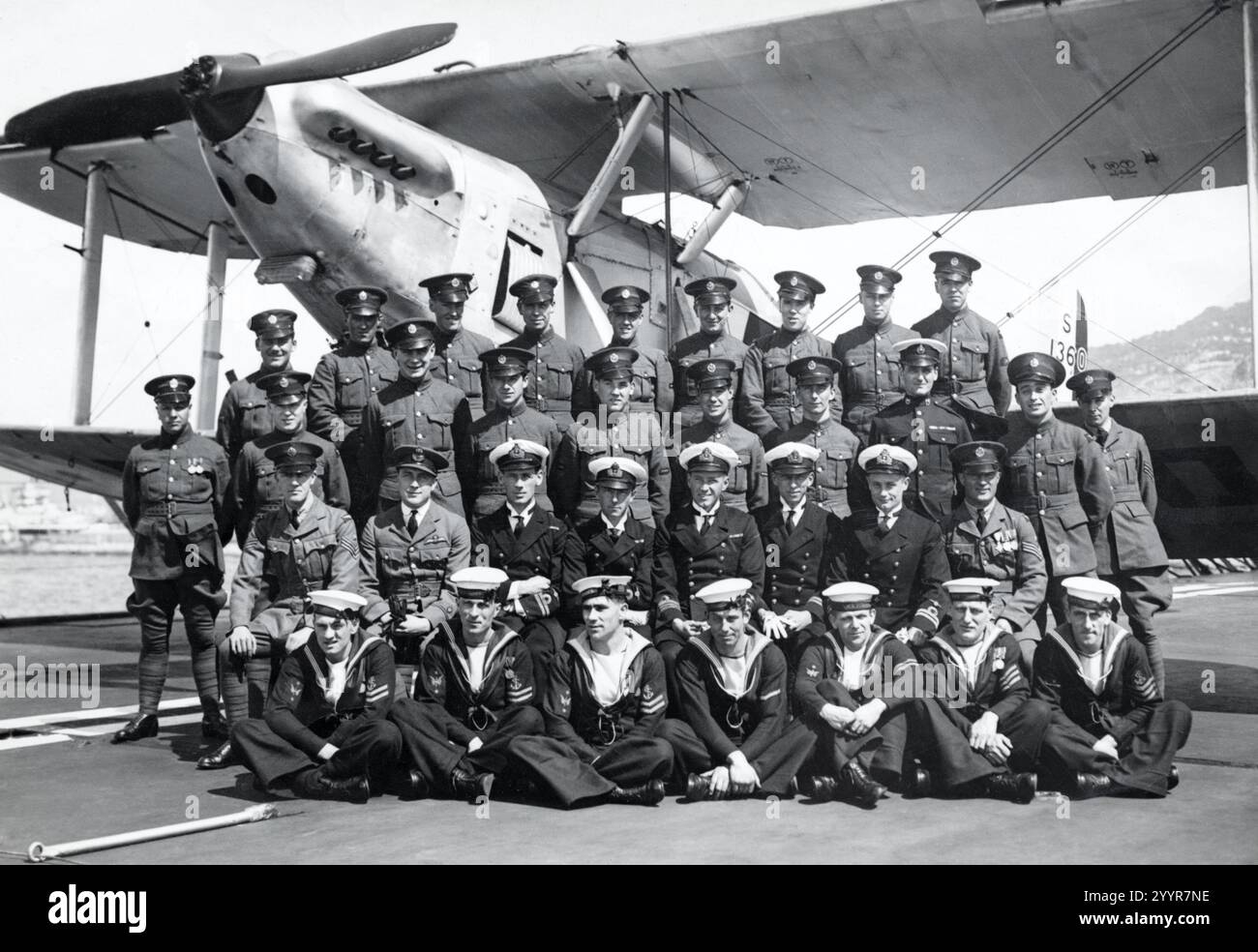Royal Air Force and Fleet Air Arm personnel in front of a Blackburn ...