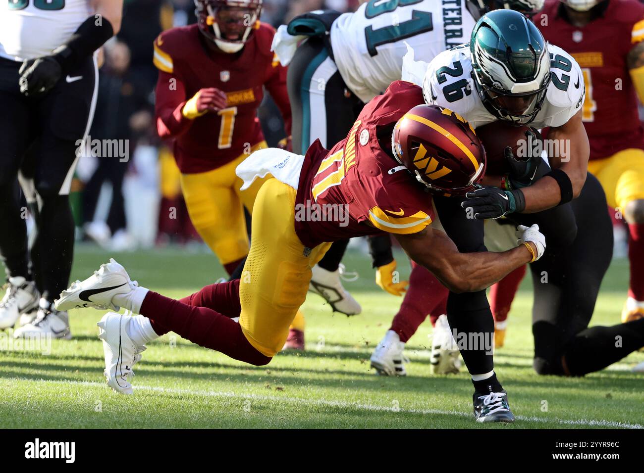 Washington Commanders safety Jeremy Chinn (11) takes down Philadelphia ...