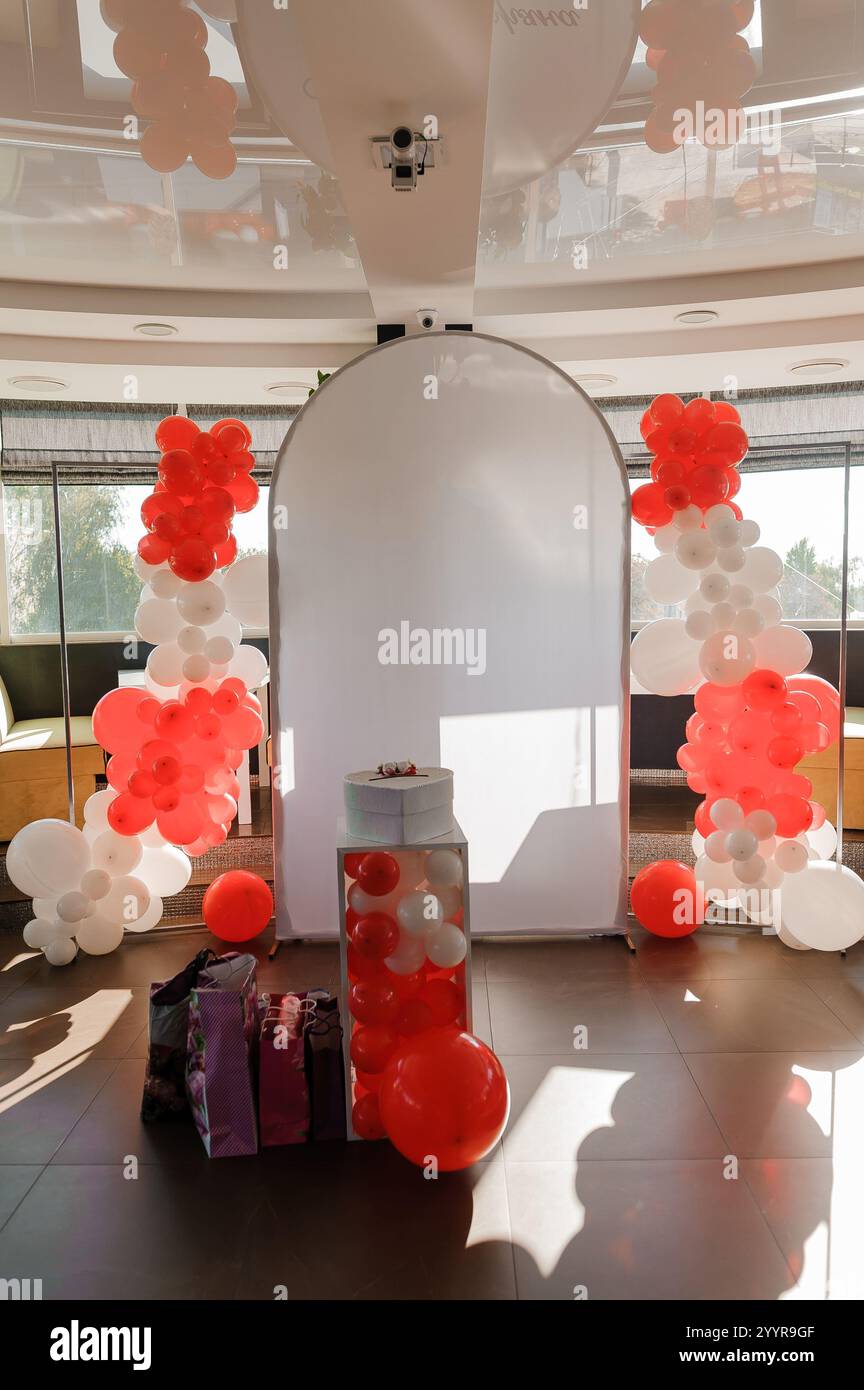 Elegant Party Setup with Red and White Balloons Stock Photo - Alamy