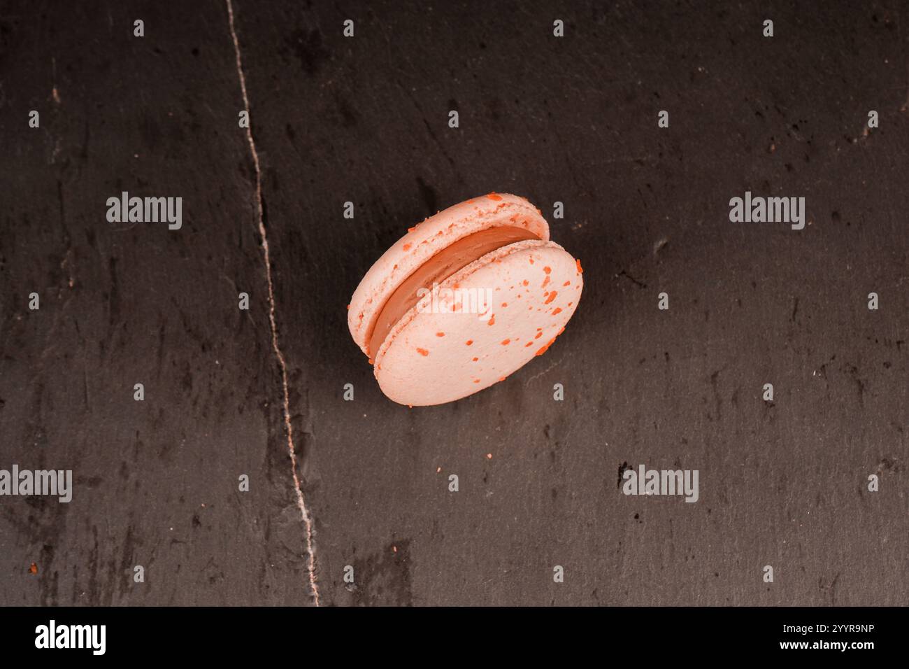 pantone palette. Pastel color macarons, placed on a black background ...