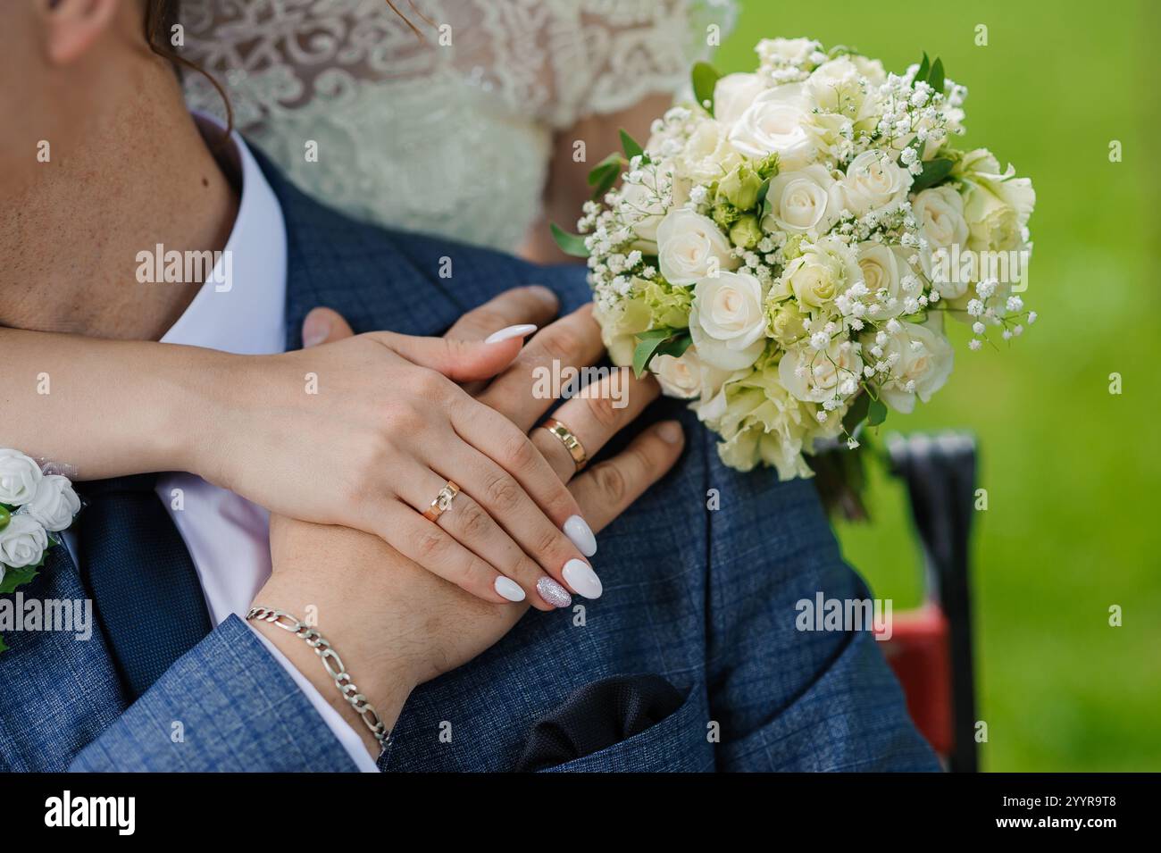 Romantic Wedding Close-Up of Bride and Groom with Flowers and Rings ...