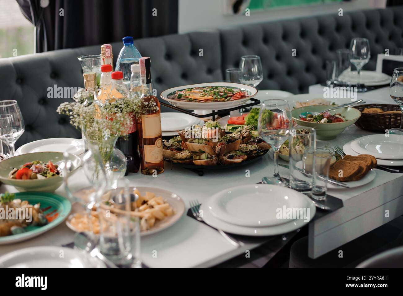 Elegant Dining Table Set with Gourmet Dishes and Refreshing Drinks ...