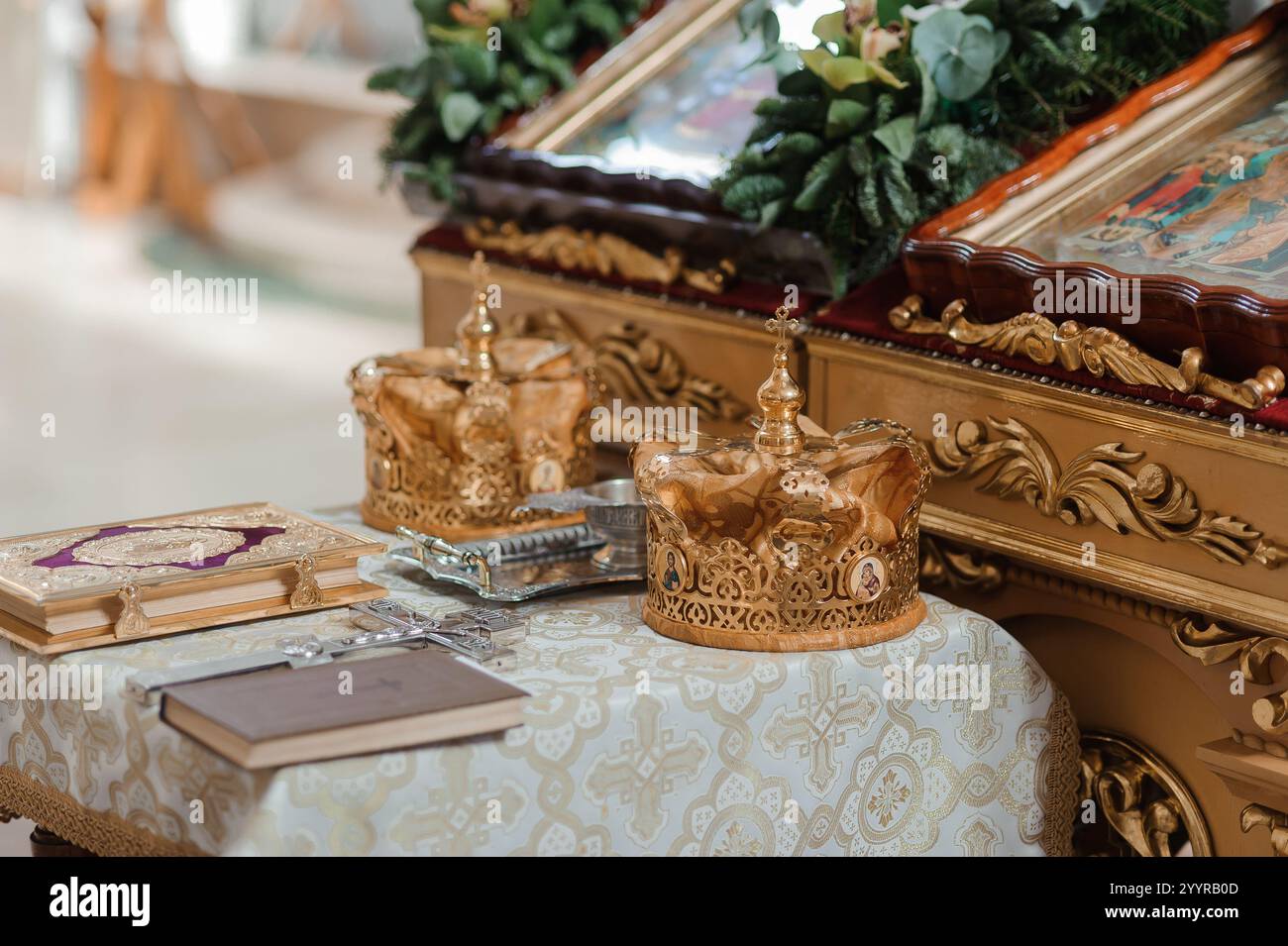 Ornate Golden Crowns on an Altar Surrounded by Religious Icons and ...