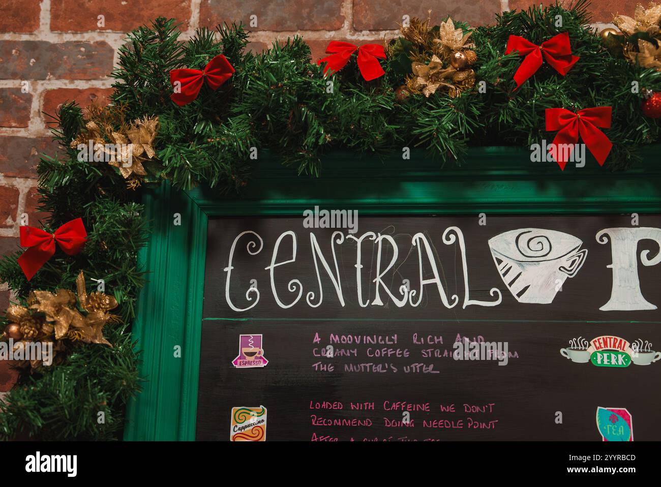 Chalkboard Sign with Central Perk Logo and Festive Decorations Stock ...
