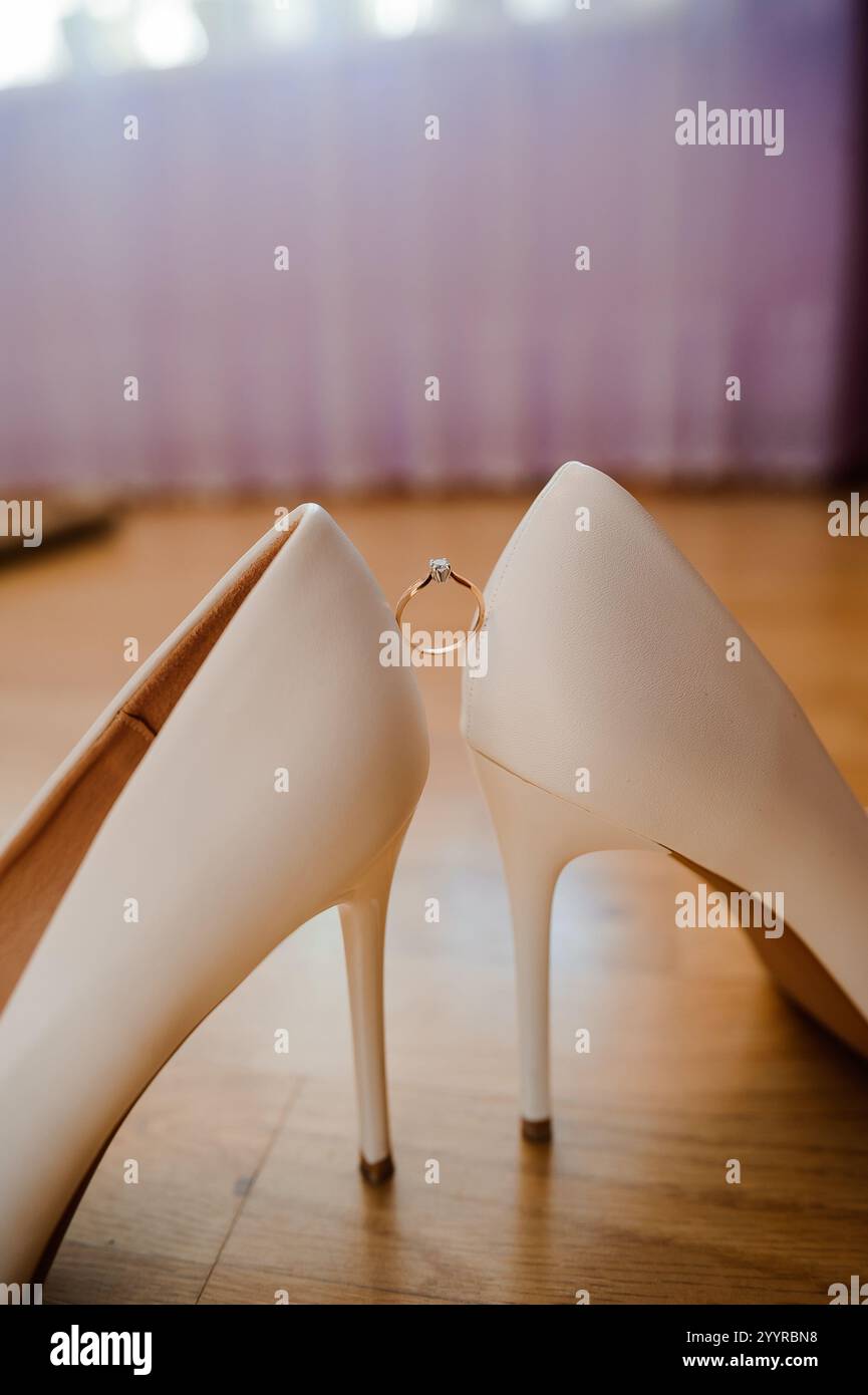 Elegant Bride's High Heels with Engagement Ring Stock Photo - Alamy