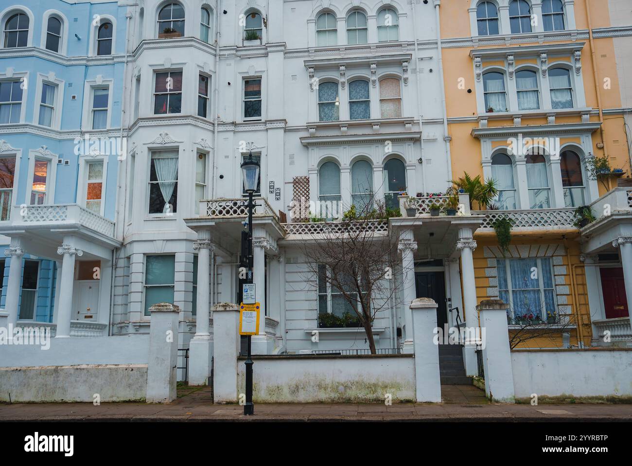 Victorian Terraced Houses with Pastel Facades in London Stock Photo - Alamy