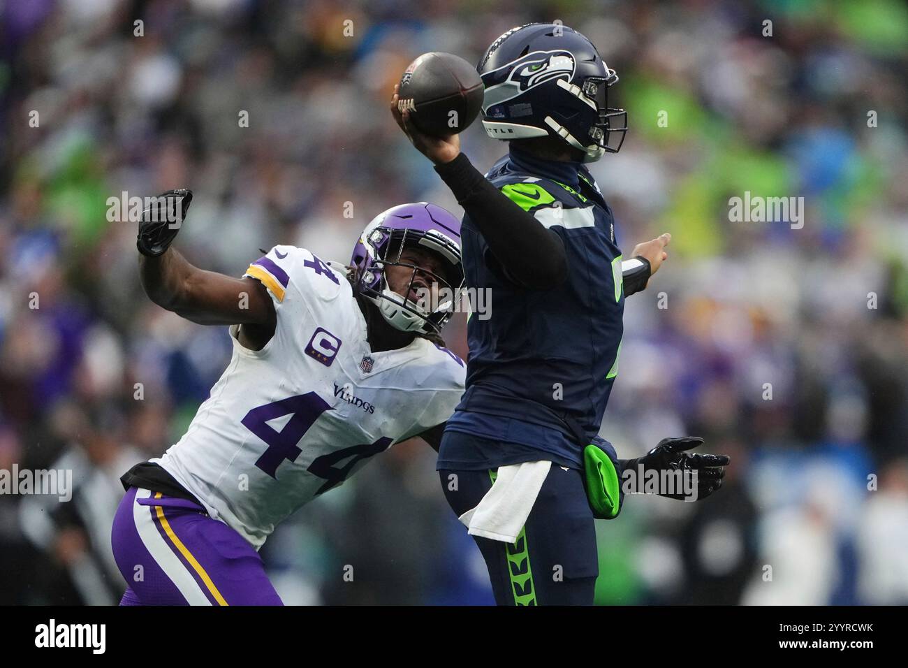 Seattle Seahawks quarterback Geno Smith (7) throws while pressured by ...