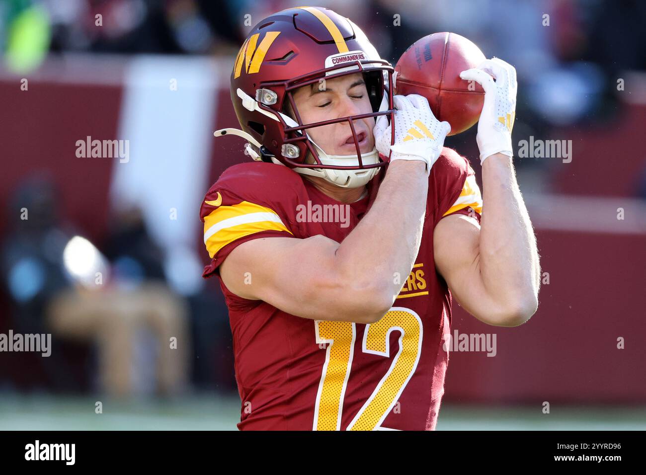 Washington Commanders wide receiver Luke McCaffrey (12) attempts to ...