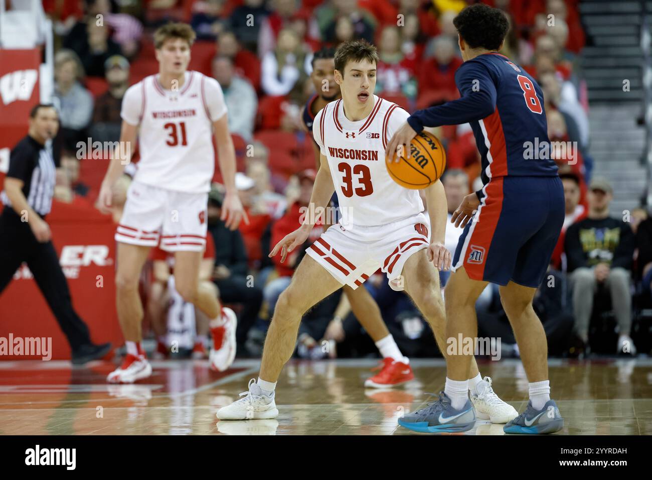 Madison, WI, USA. 22nd Dec, 2024. Wisconsin Badgers guard Jack Janicki ...