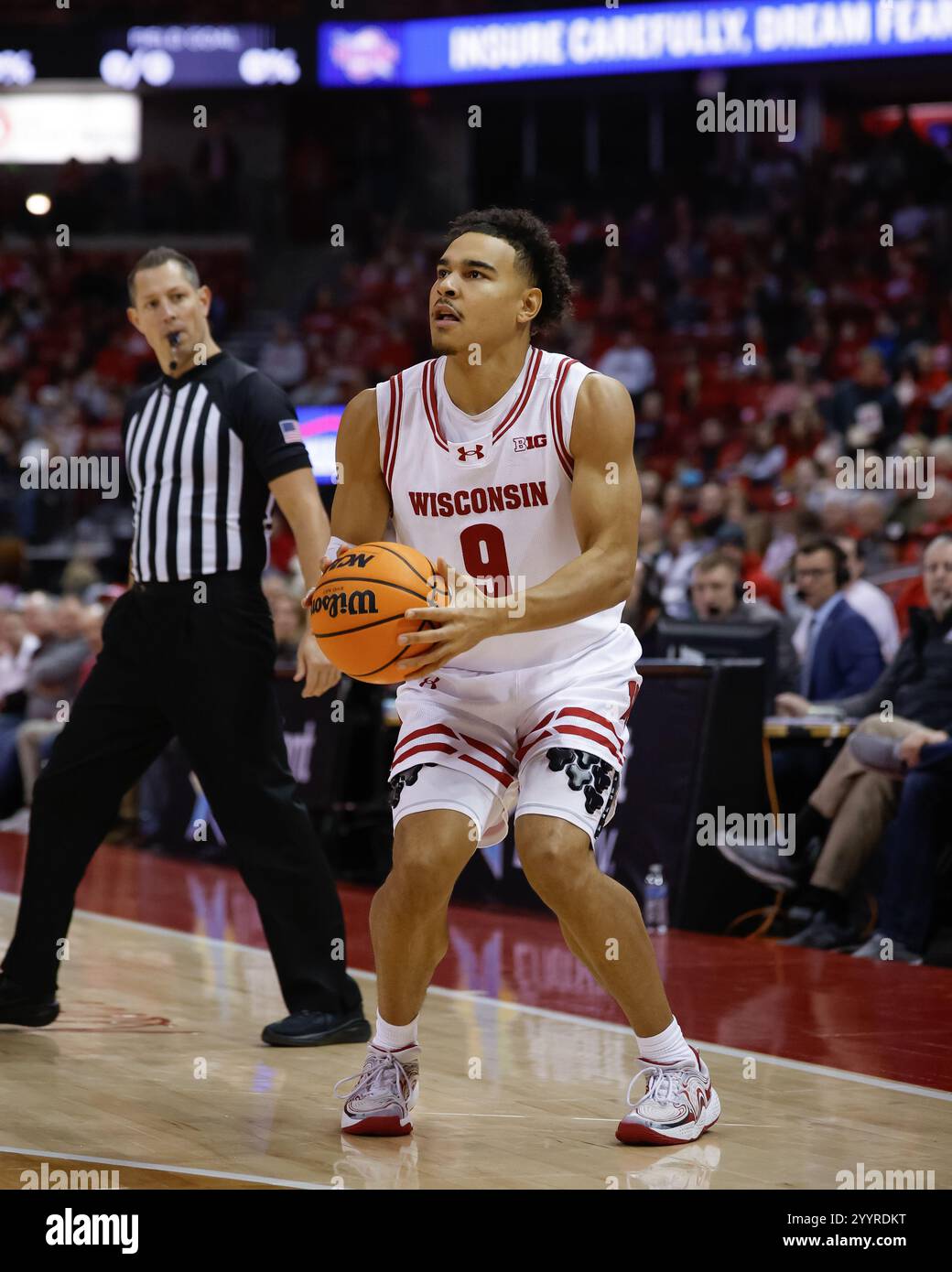 Madison, WI, USA. 22nd Dec, 2024. Wisconsin Badgers guard John Tonje (9 ...