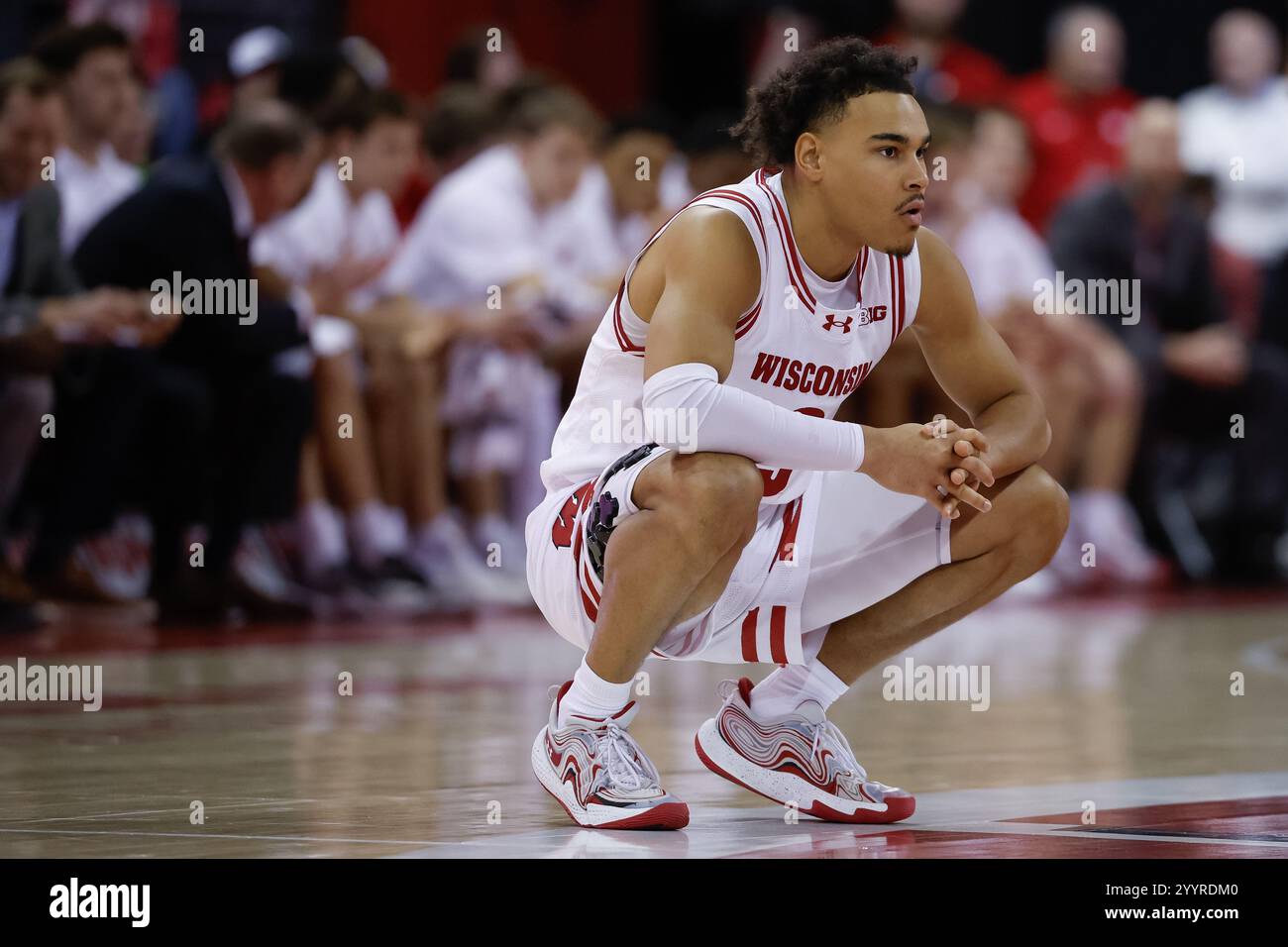 Madison, WI, USA. 22nd Dec, 2024. Wisconsin Badgers guard John Tonje (9 ...