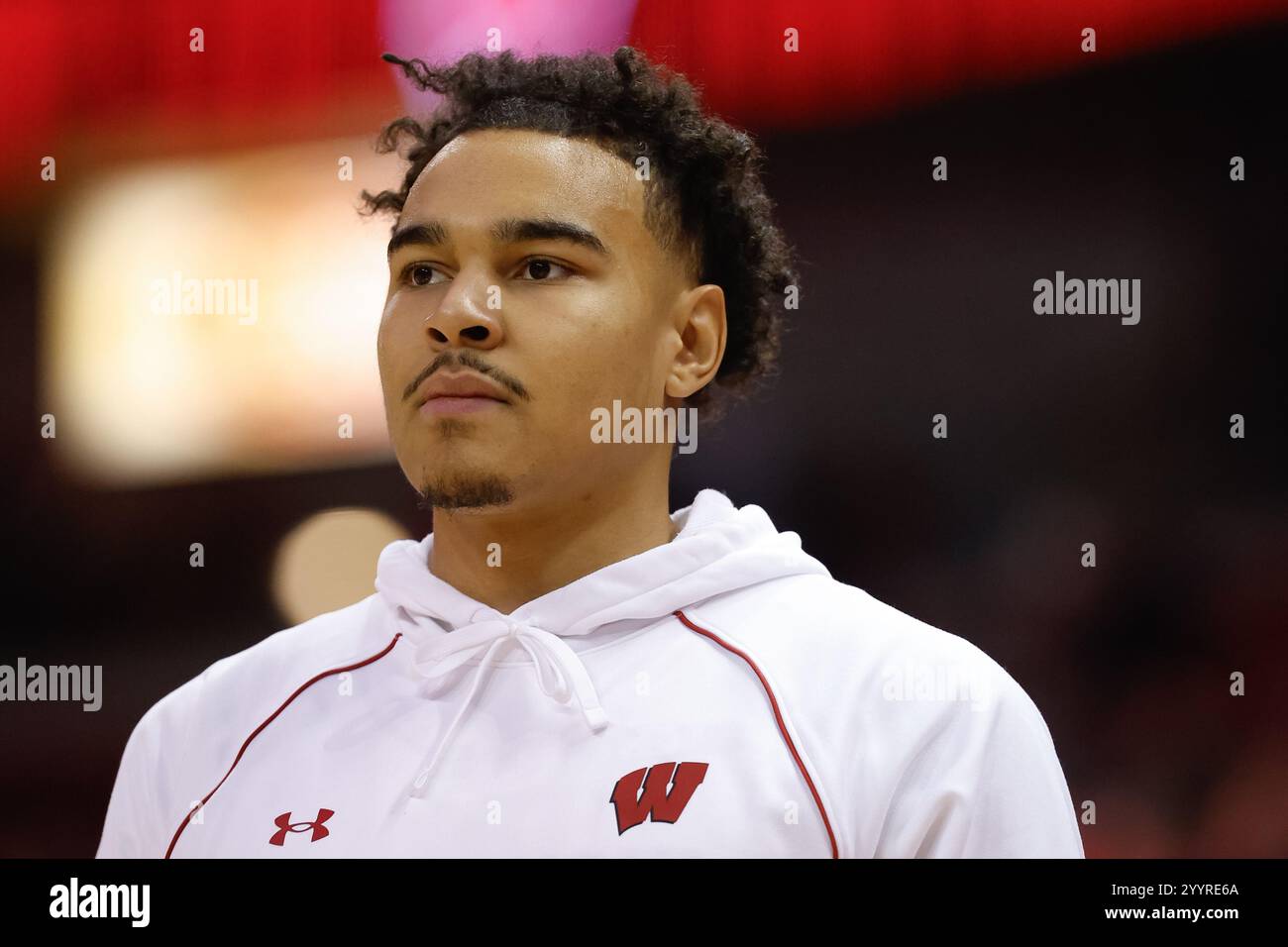 Madison, WI, USA. 22nd Dec, 2024. Wisconsin Badgers guard John Tonje (9 ...