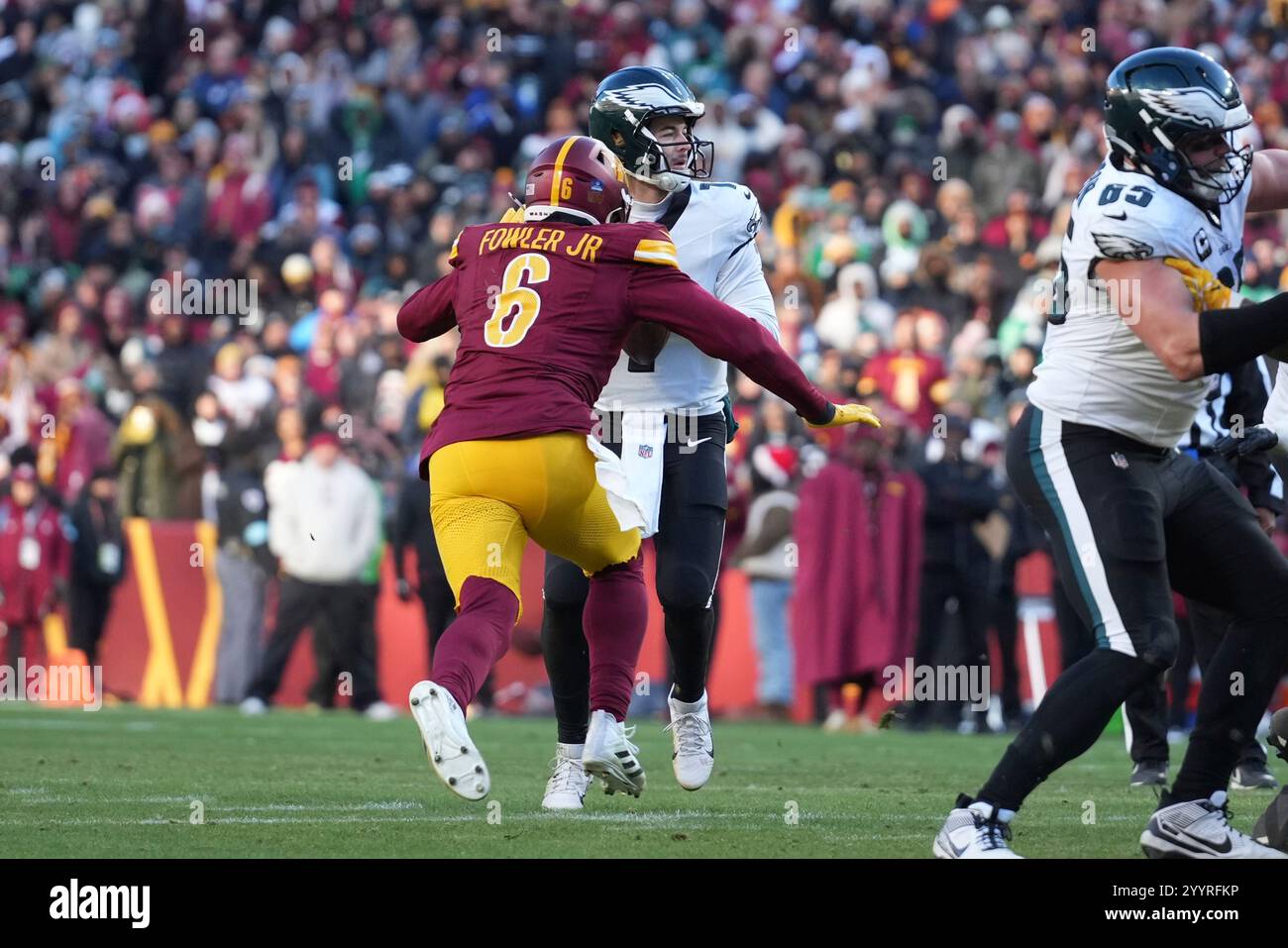 Philadelphia Eagles quarterback Kenny Pickett (7) gets sacked by ...