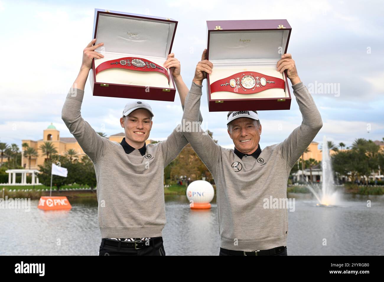 Bernhard Langer, right, and his son Jason Langer hold the championship ...