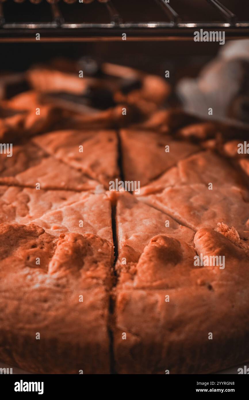 Chicken pie front view close up. Display case with a variety of cakes ...