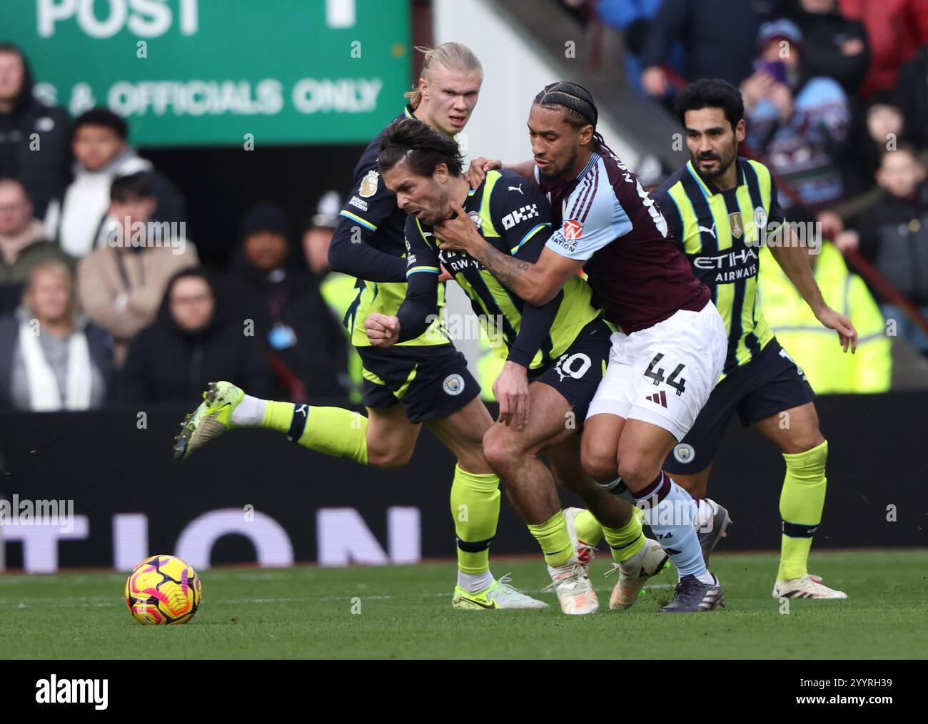 Birmingham, UK. 21st Dec, 2024. Jack Grealish (MC) Boubacar Kamara (AV) at the Aston Villa v ...