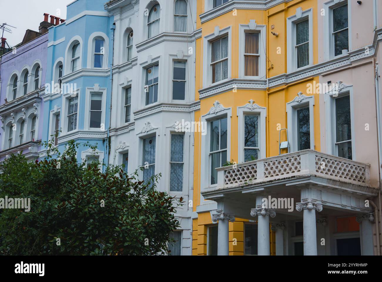Victorian Terraced Houses in London with Pastel Colors and Ornate ...