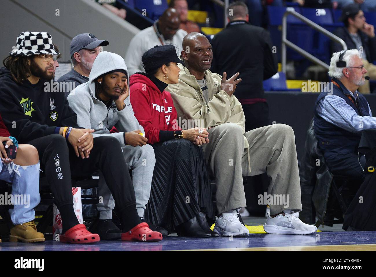 SPRINGFIELD, MA - DECEMBER 21: Former NBA player Jamal Mashburn watches ...