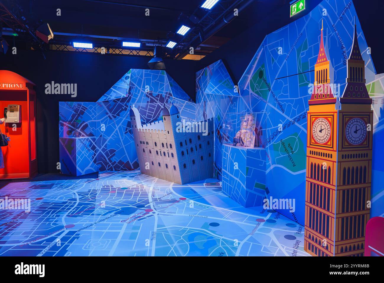 London Themed Exhibit with Big Ben Model and Red Telephone Booth Stock ...