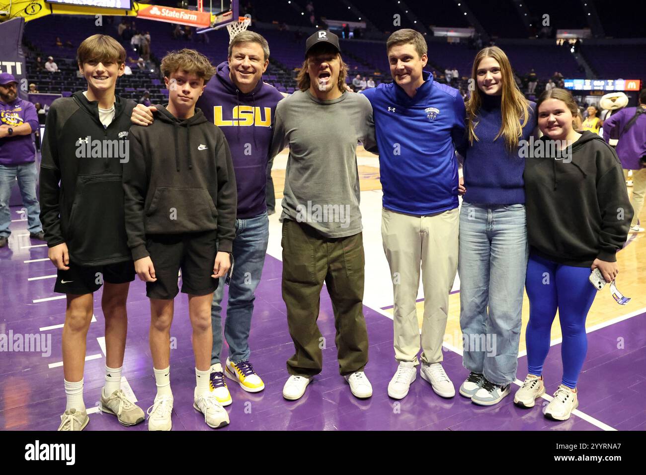 Baton Rouge, United States. 22nd Dec, 2024. (Center three) Raising Cane ...