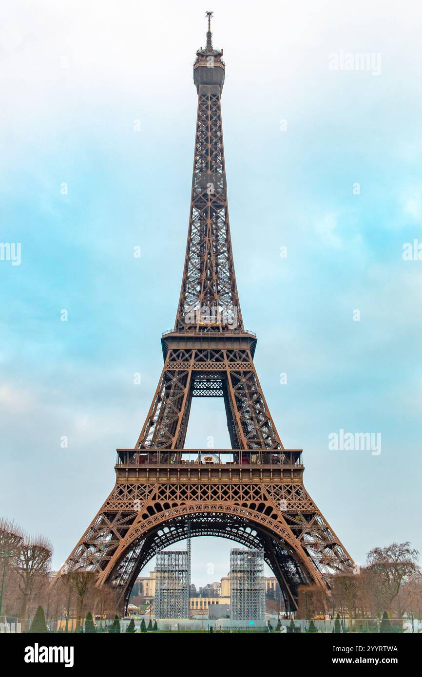 Iconic landmark the Eiffel Tower on a cold cloudy Paris France morning ...