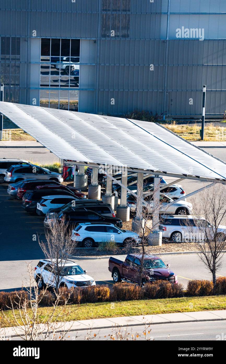 Calgary Alberta Canada, October 30 2024: Cars parked under a solar ...