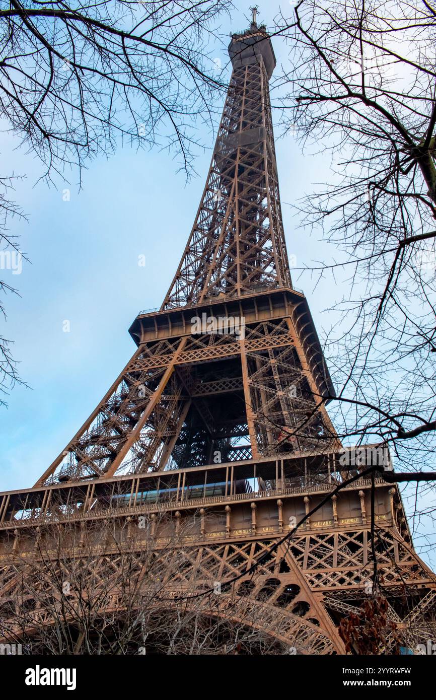 Iconic landmark the Eiffel Tower on a cold cloudy Paris France morning ...