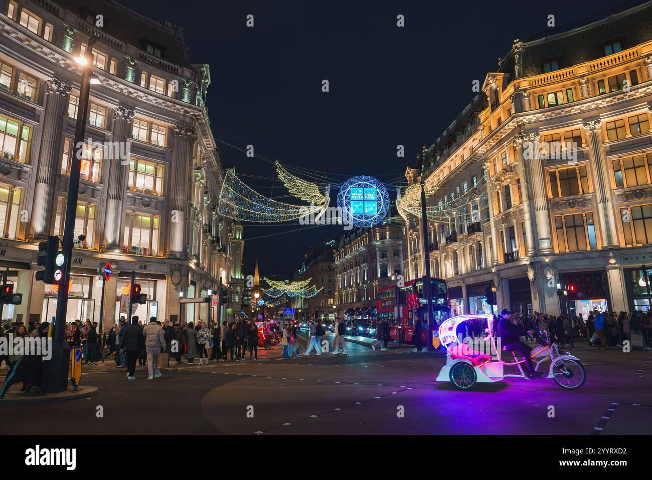 Festive Oxford Circus with Illuminated Globe and Angel Wings Stock ...