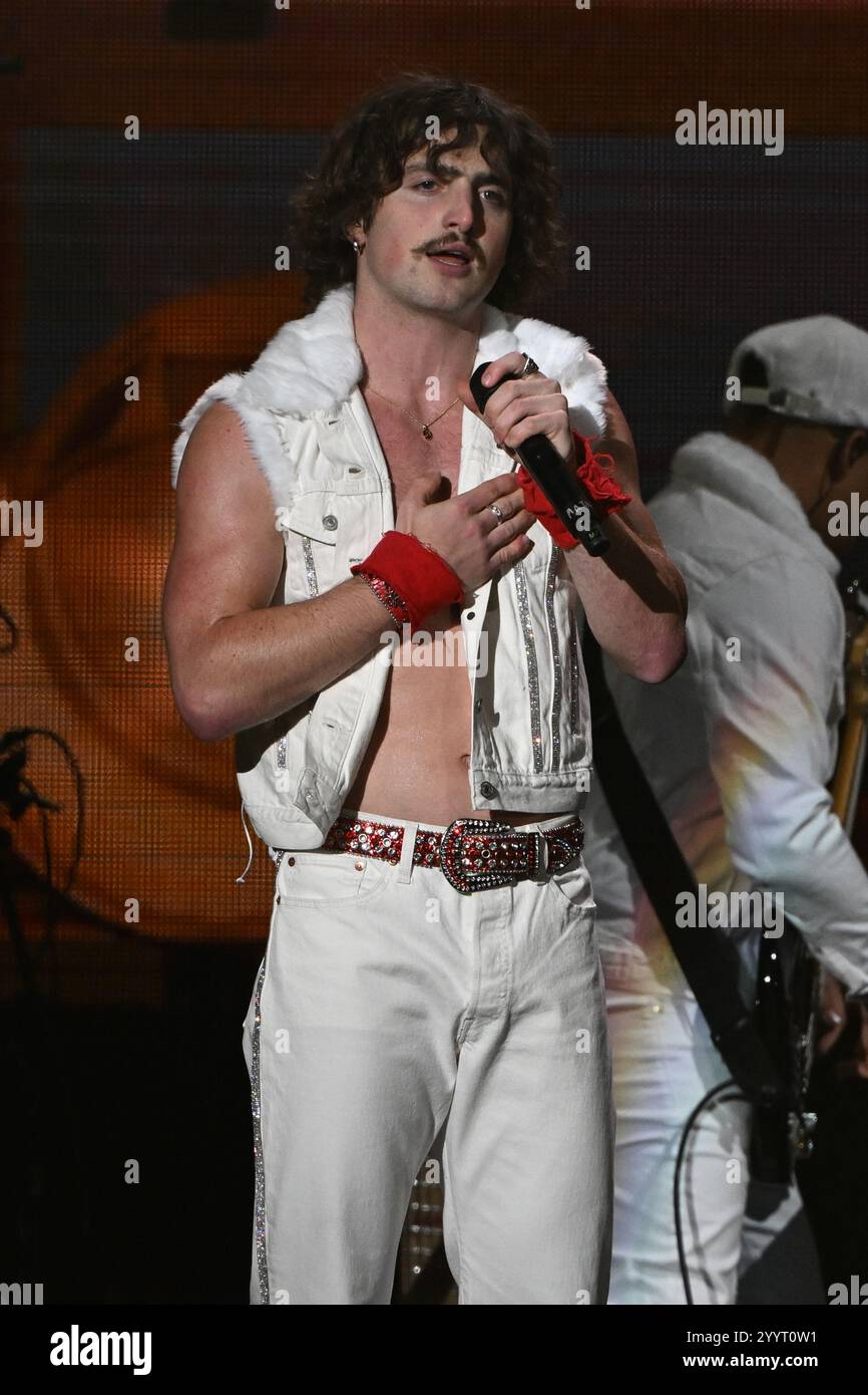 Miami, FL, USA. 21st Dec, 2024. Benson Boone performs during The ...