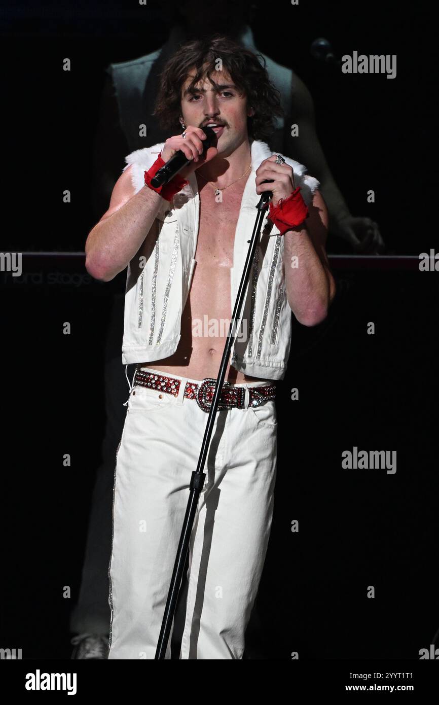 Miami, FL, USA. 21st Dec, 2024. Benson Boone performs during The ...