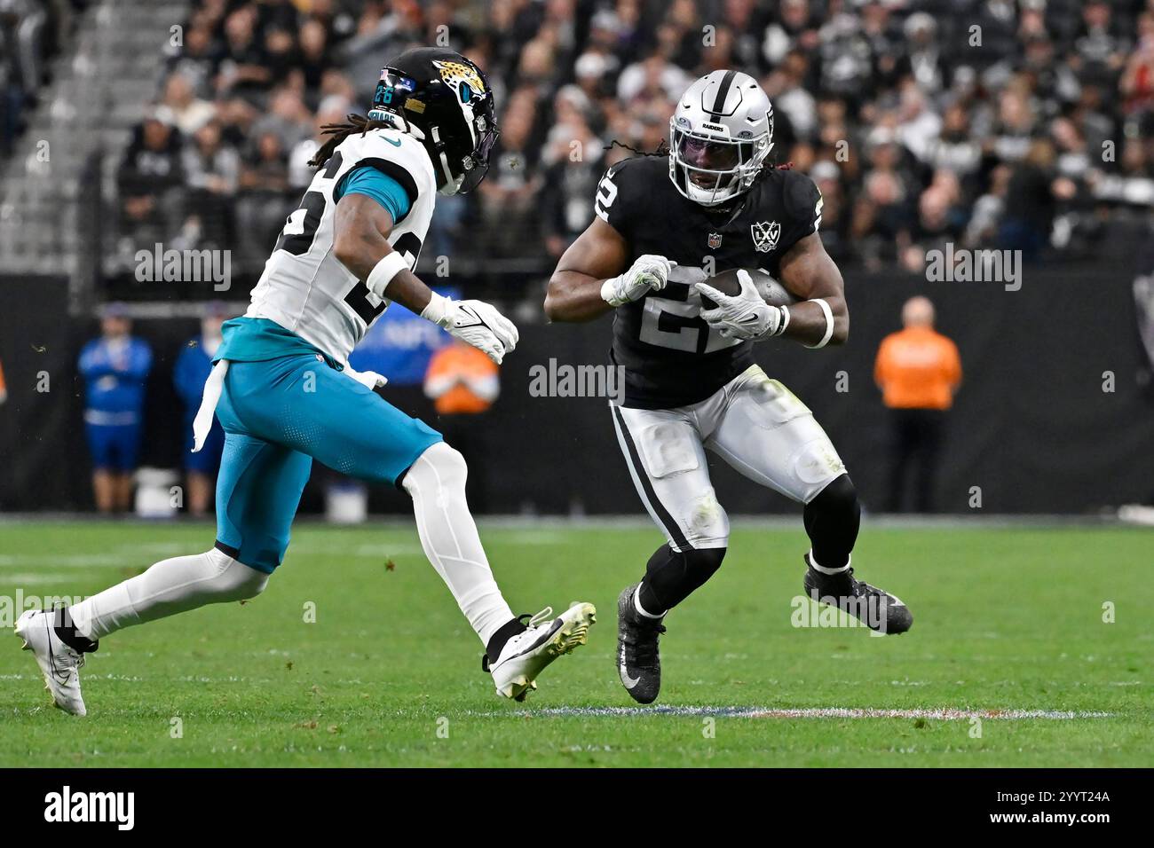 Las Vegas Raiders running back Alexander Mattison, right, runs against ...
