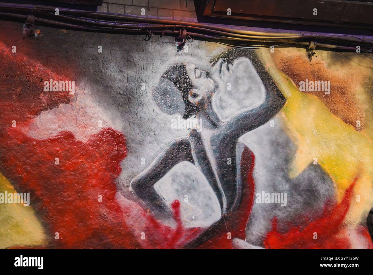 Vibrant Mural on Brick Wall with Dynamic Figure in London Stock Photo ...