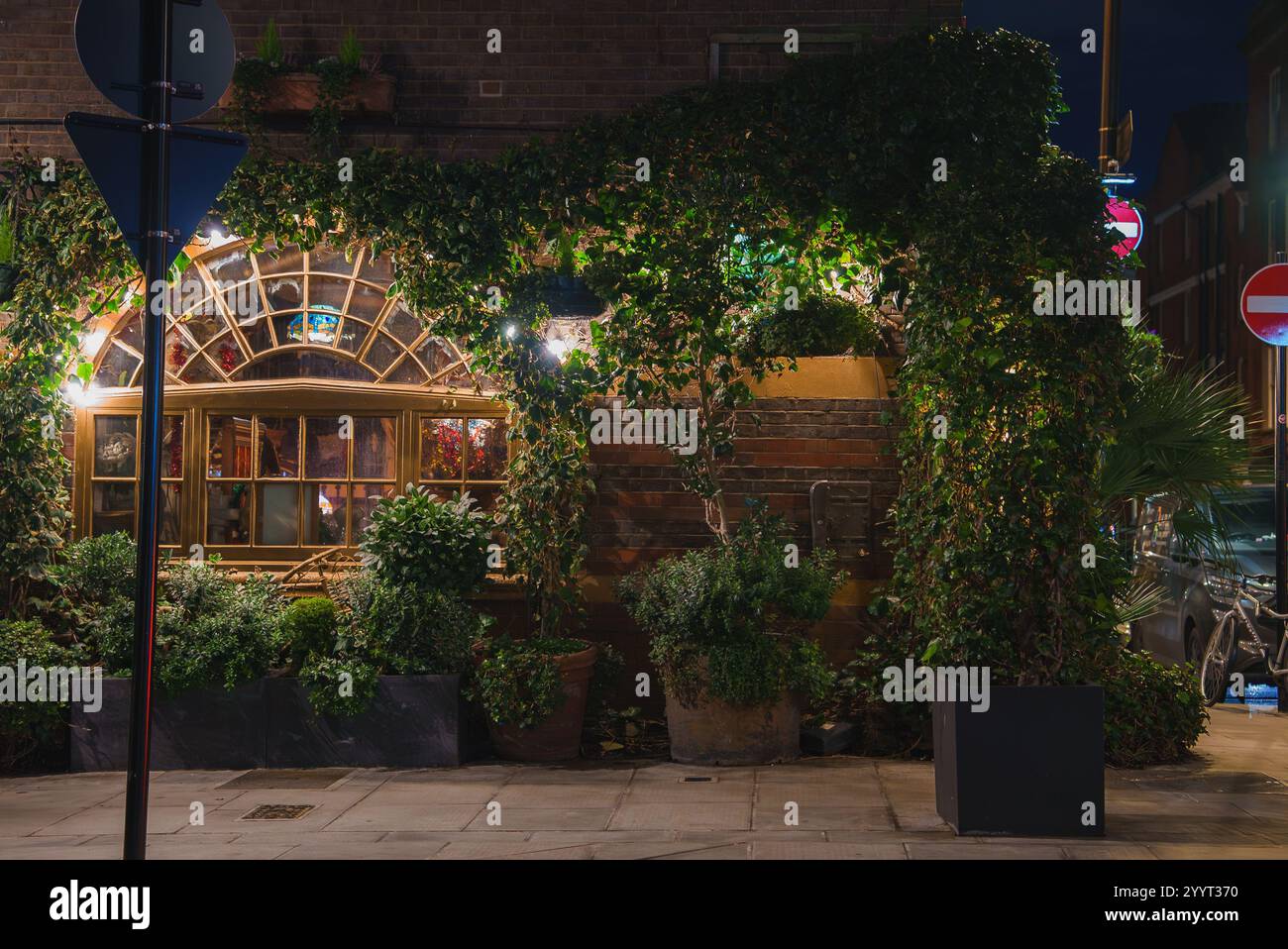 London Street Scene with Festive Pub and Historic Architecture Stock ...