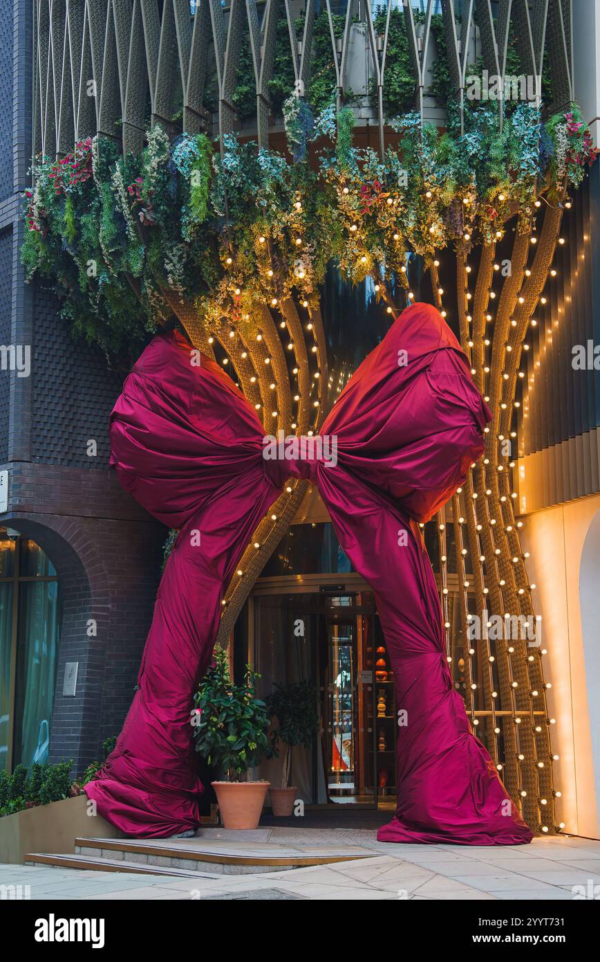Festive Entrance in London with Red Bow and Twinkling Lights Stock ...