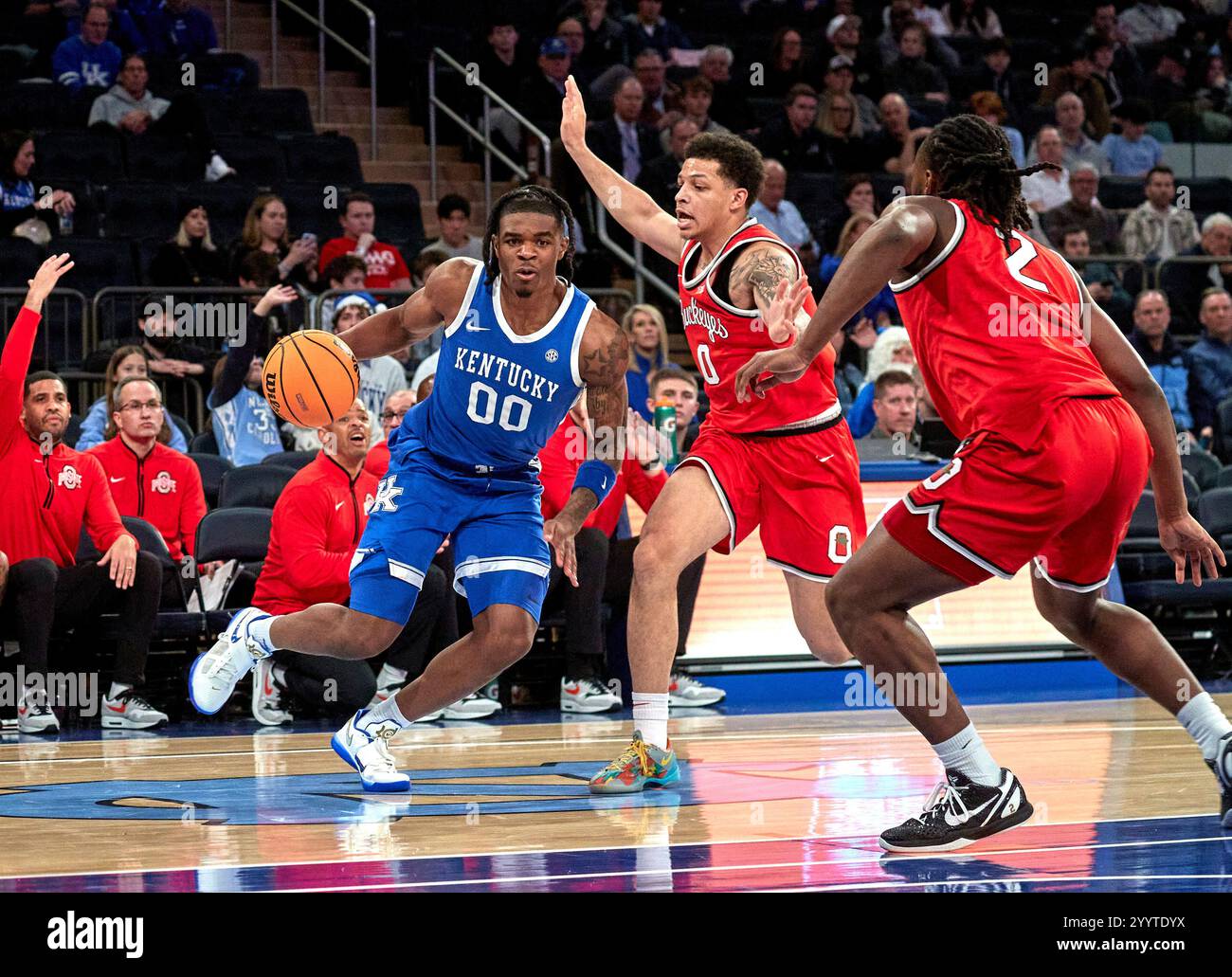 Kentucky Wildcats guard Otega Oweh (00) is defended by Ohio State ...