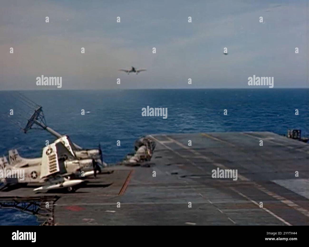 Douglas A-1H Skyraider of VA-52 approaching USS Ticonderoga (CVA-14) in ...
