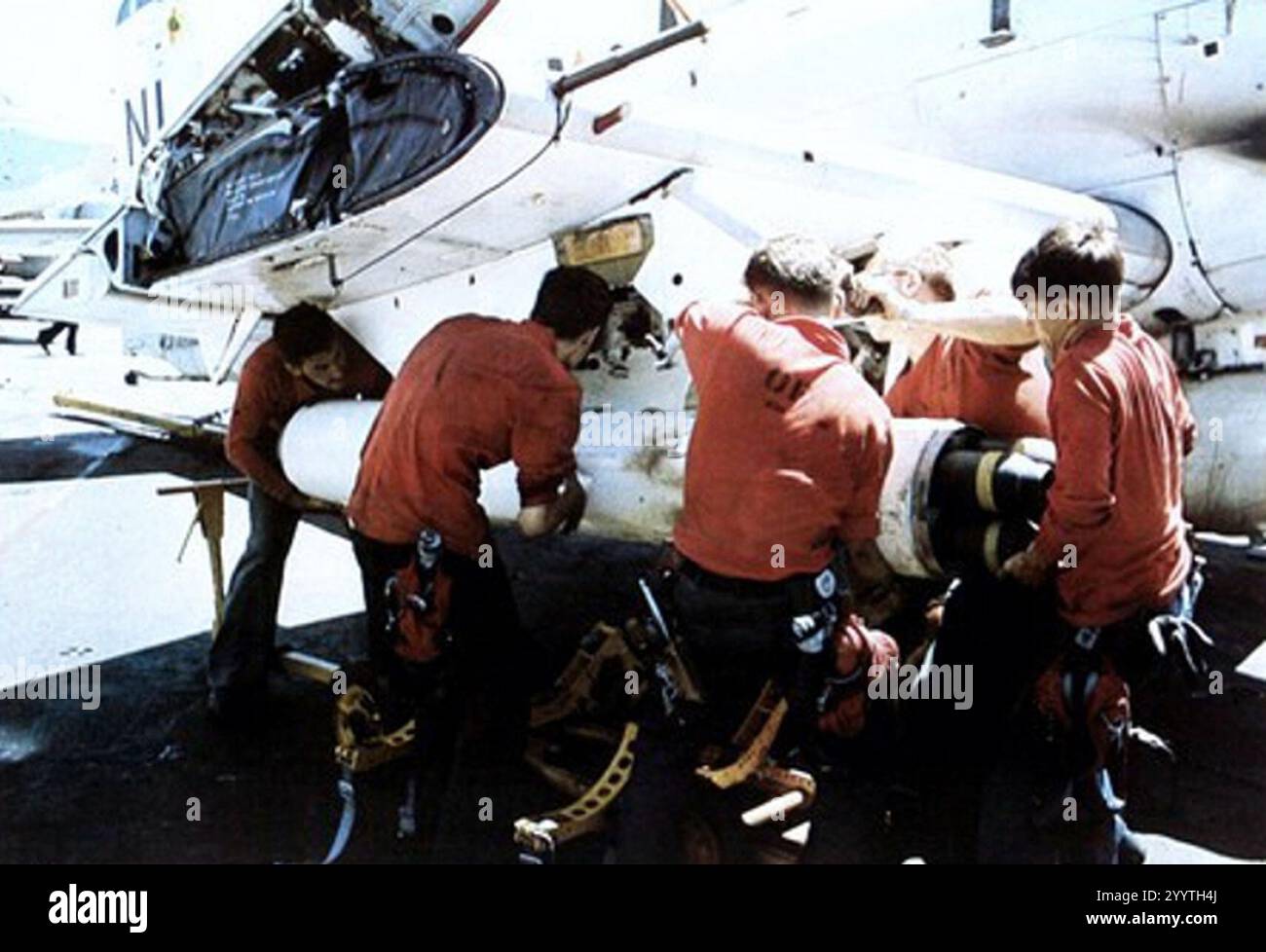 Douglas A-1H Skyraider of VA-25 is armed aboard USS Coral Sea (CVA-43 ...