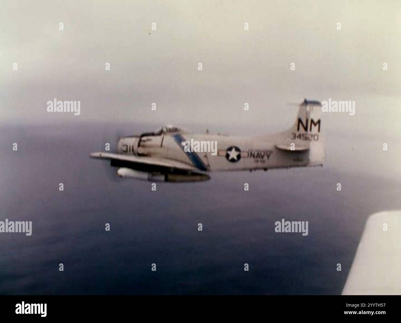 Douglas A-1H Skyraider of VA-52 in flight over the Gulf of Tonkin ...
