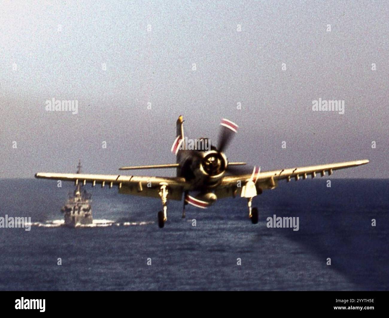Douglas A-1H Skyraider of VA-165 pproaching USS Intrepid (CVS-11), in ...
