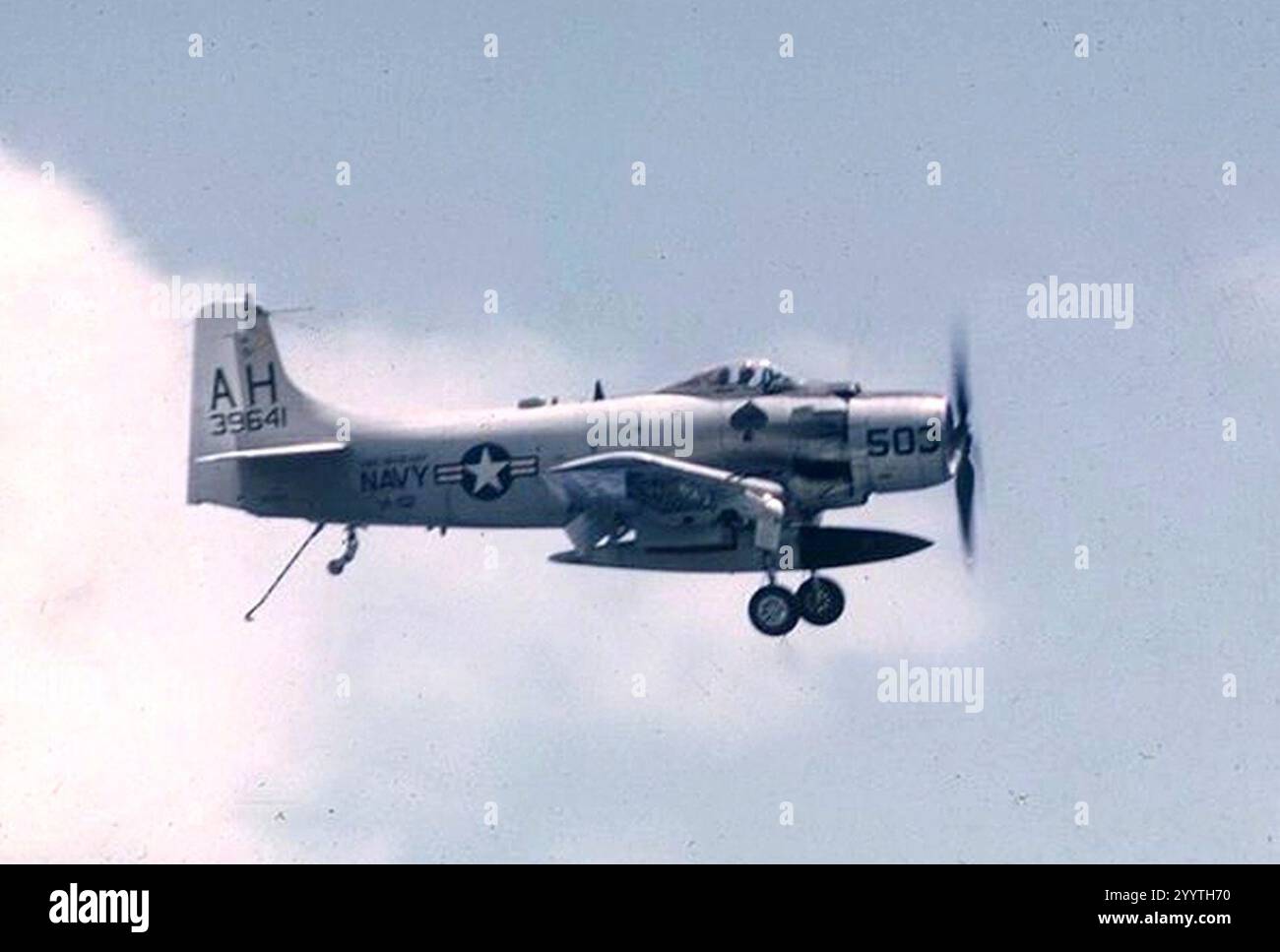 Douglas A-1H Skyraider of VA-152 in flight with tail hook and landing ...