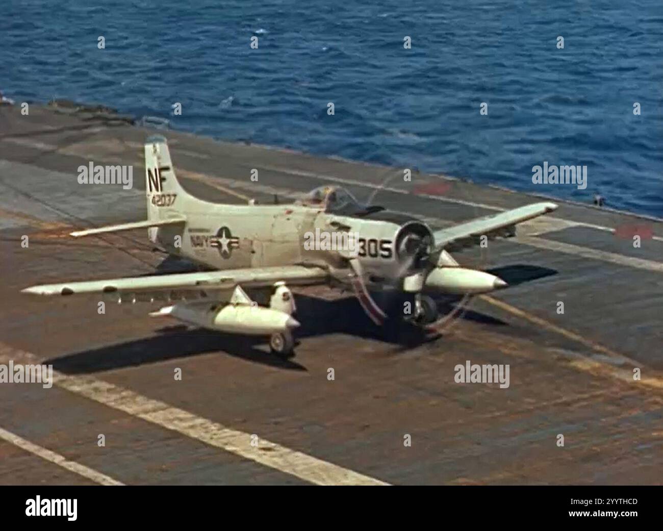 Douglas A-1J Skyraider of VA-52 landing aboard USS Ticonderoga (CVA-14 ...