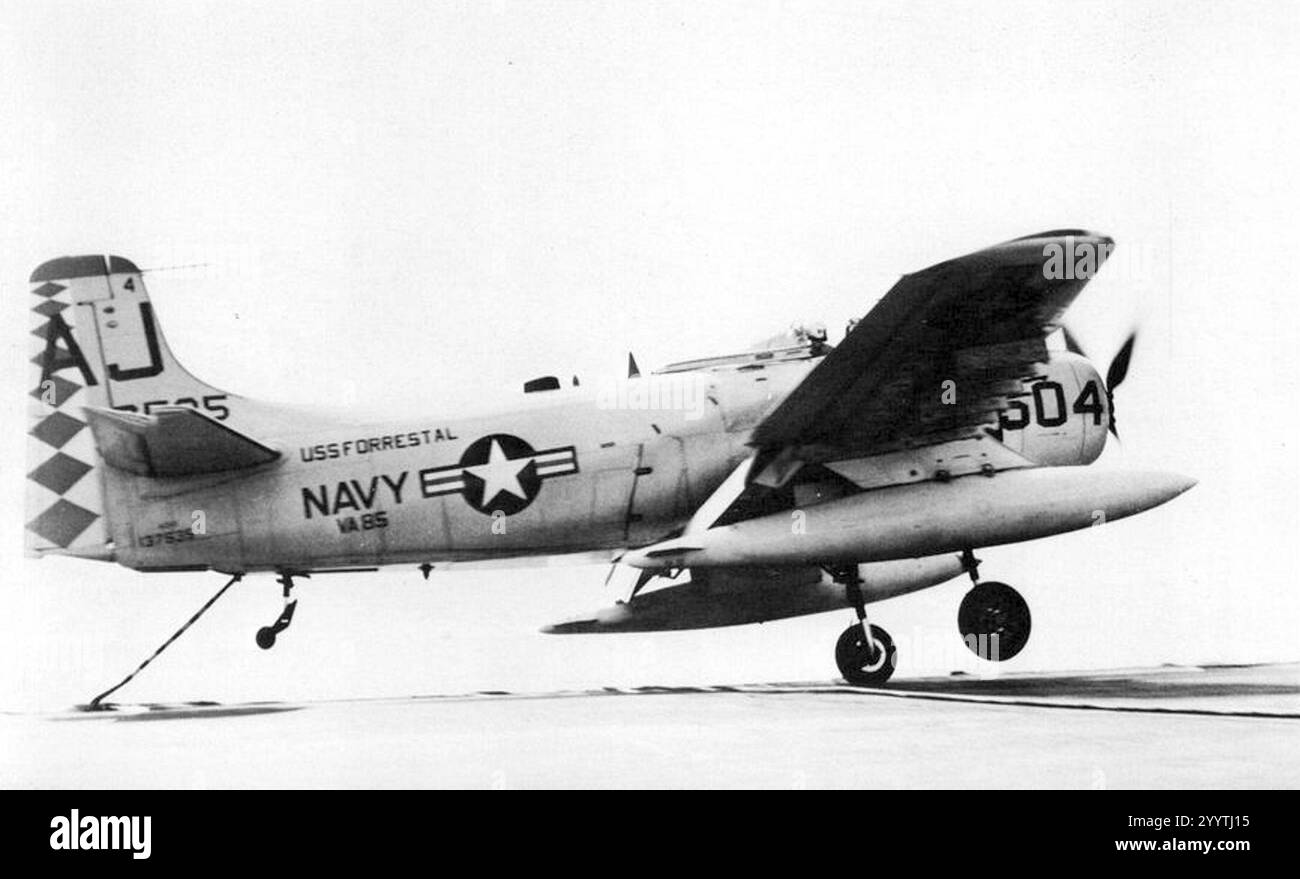 Douglas AD-6 Skyraider of VA-85 lands aboard USS Forrestal (CVA-59), in ...