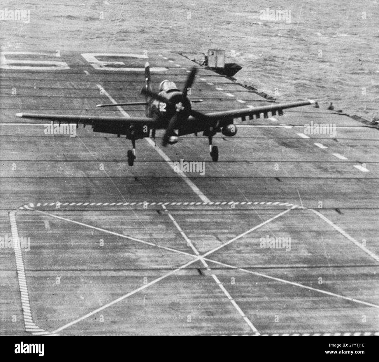 Douglas AD-6 Skyraider of VA-85 lands aboard USS Lake Champlain (CVA-39 ...