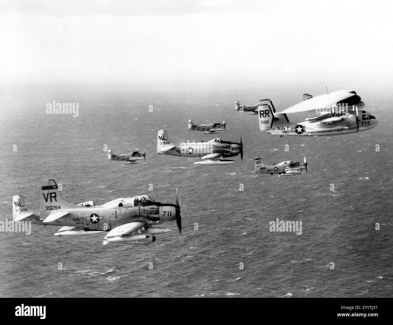 Douglas AD-6 Skyraiders of VA-152 in flight with AD-5Q Skyraiders of ...