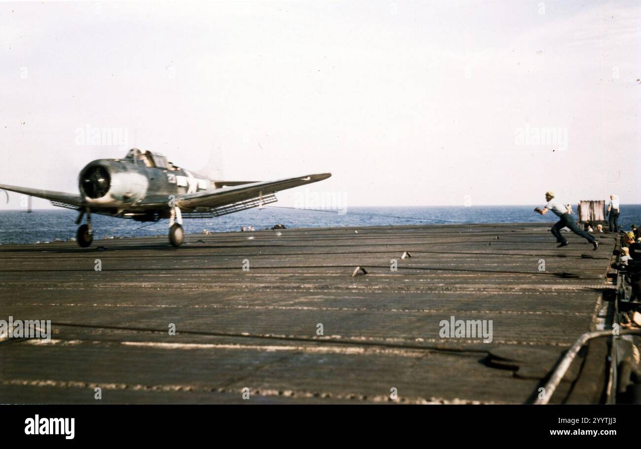 Douglas SBD-5 Dauntless of VB-16 lands aboard USS Lexington (CV-16), circa in November 1943 ...