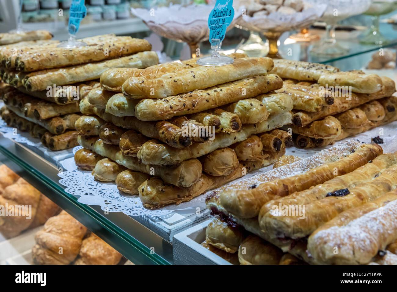 Chocolate pastries and some other pastries at background Stock Photo ...