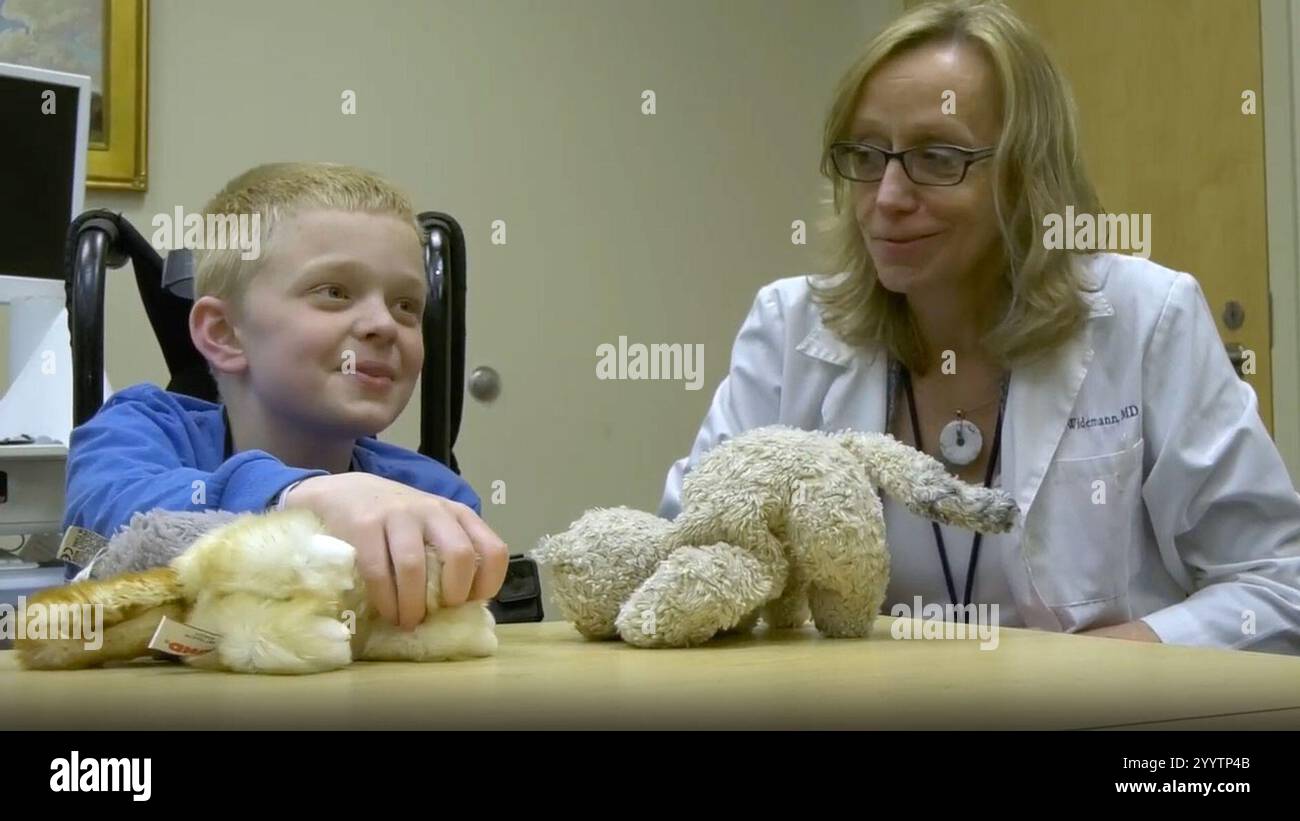 Dr. Brigitte Widemann with NF1 patient Travis Carpenter (49677211206 ...
