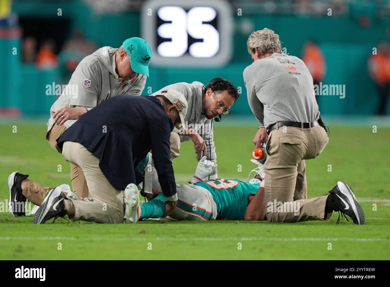 Miami Dolphins cornerback Kendall Fuller (29) is assisted on the field ...