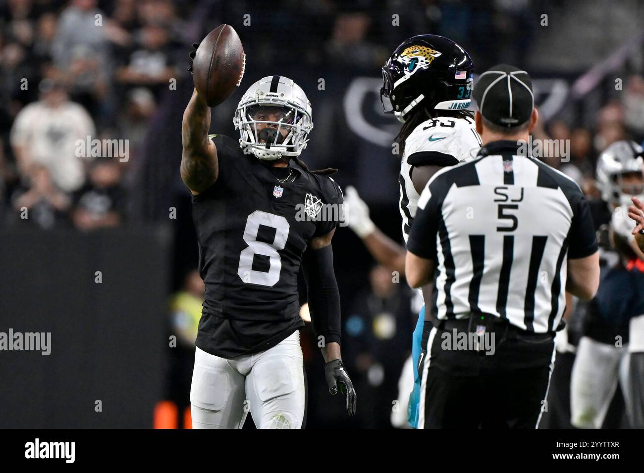 Las Vegas Raiders running back Ameer Abdullah (8) celebrates a first ...