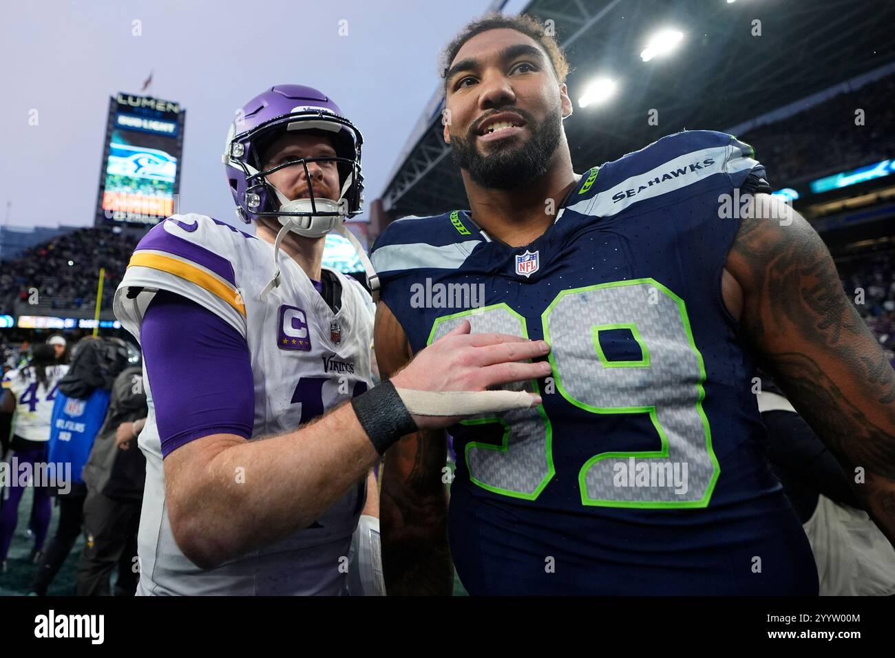 Minnesota Vikings quarterback Sam Darnold (14) and Seattle Seahawks ...
